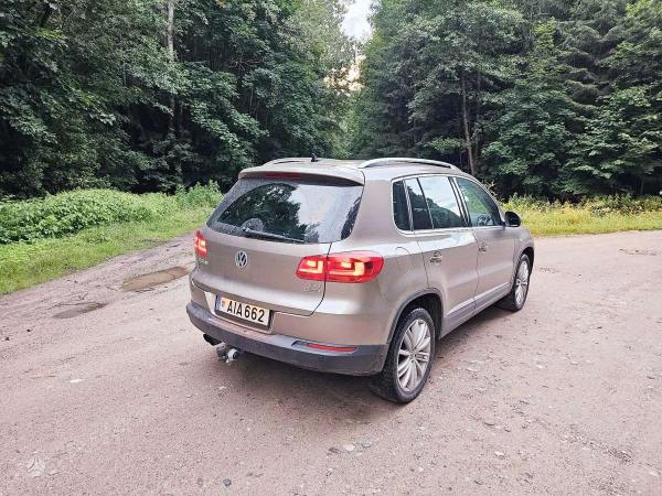 Brown Volkswagen Tiguan 2012 in Kaunas, with an engine capacity of 1.39 L and mileage of 187 thousand km for 4900 €, photo 3 on AUTOMOTO.COM.LV