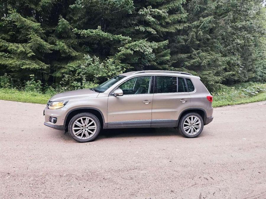 Brown Volkswagen Tiguan 2012 in Kaunas, with an engine capacity of 1.39 L and mileage of 187 thousand km for 5200 €, photo 12 on AUTOMOTO.COM.LV