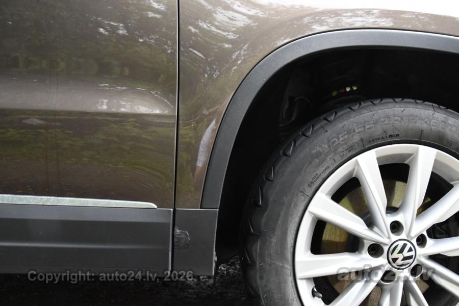Brown Volkswagen Tiguan 2012 in Tallinn, with an engine capacity of 1.40 L and mileage of 227 thousand km for 8500 €, photo 24 on AUTOMOTO.COM.LV