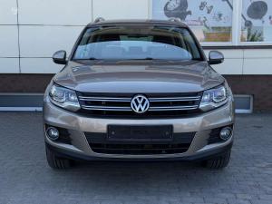 Brown Volkswagen Tiguan 2012 in Kretinga, with an engine capacity of 1.97 L and mileage of 283 thousand km for 7850 €, photo 4 on AUTOMOTO.COM.LV