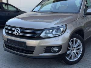 Brown Volkswagen Tiguan 2012 in Kretinga, with an engine capacity of 1.97 L and mileage of 283 thousand km for 7850 €, photo 6 on AUTOMOTO.COM.LV