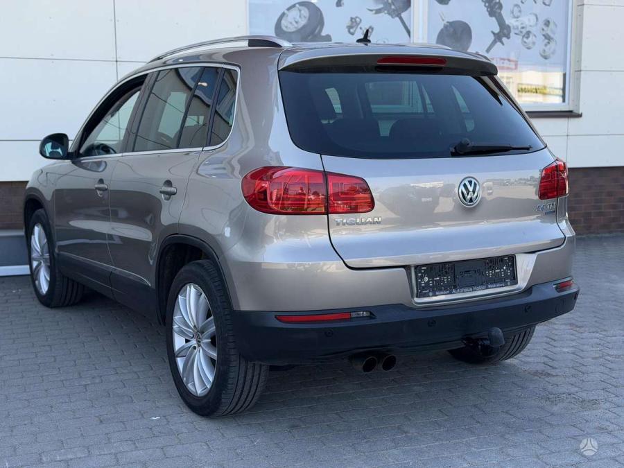 Brown Volkswagen Tiguan 2012 in Kretinga, with an engine capacity of 1.97 L and mileage of 283 thousand km for 7850 €, photo 7 on AUTOMOTO.COM.LV