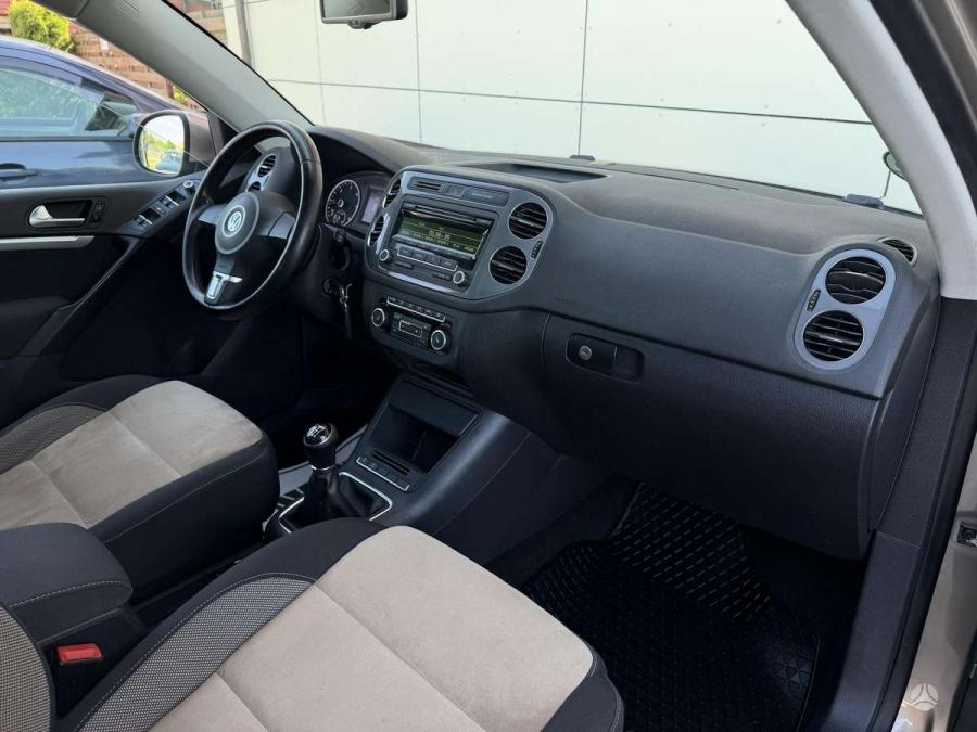 Brown Volkswagen Tiguan 2012 in Kretinga, with an engine capacity of 1.97 L and mileage of 283 thousand km for 7850 €, photo 19 on AUTOMOTO.COM.LV