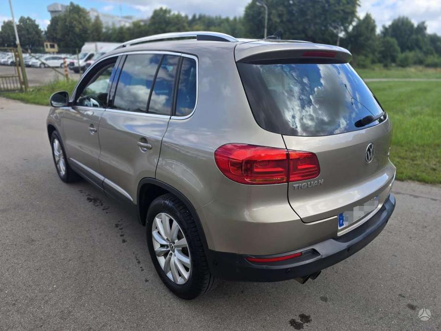 Brūns Volkswagen Tiguan 2012 Tauragė, ar dzinēja tilpumu 1.97 L un nobraukumu 310 tūkst. km par 6900 €, foto 4 vietnē AUTOMOTO.COM.LV