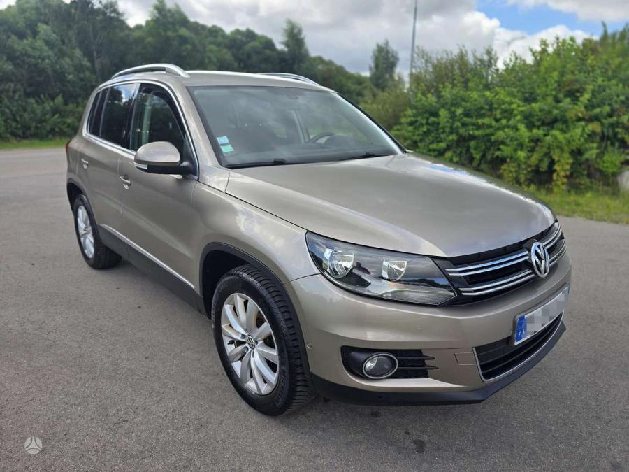 Brūns Volkswagen Tiguan 2012 Tauragė, ar dzinēja tilpumu 1.97 L un nobraukumu 310 tūkst. km par 6900 €, foto 7 vietnē AUTOMOTO.COM.LV