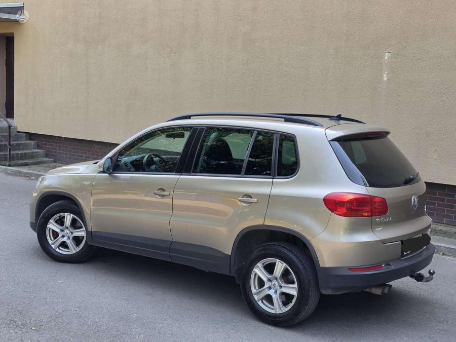 Brown Volkswagen Tiguan 2012 in Silute, with an engine capacity of 1.97 L and mileage of 330 thousand km for 5700 €, photo 5 on AUTOMOTO.COM.LV