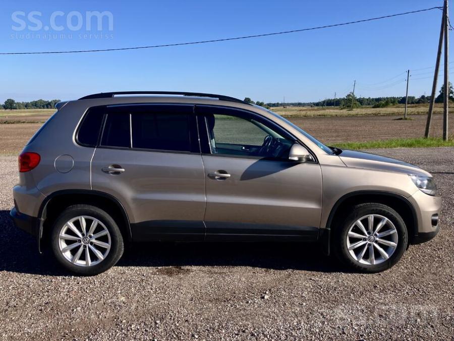 Brown Volkswagen Tiguan 2012 in Talsi, with an engine capacity of 2.00 L and mileage of 312 thousand km for 6999 €, photo 3 on AUTOMOTO.COM.LV