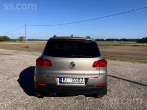 Brown Volkswagen Tiguan 2012 in Talsi, with an engine capacity of 2.00 L and mileage of 312 thousand km for 6999 €, photo 5 on AUTOMOTO.COM.LV