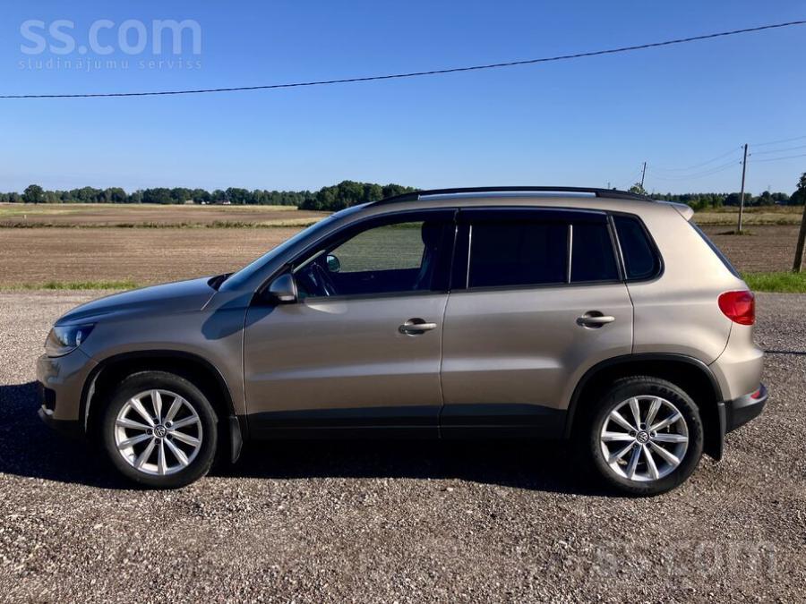 Brown Volkswagen Tiguan 2012 in Talsi, with an engine capacity of 2.00 L and mileage of 312 thousand km for 6999 €, photo 7 on AUTOMOTO.COM.LV