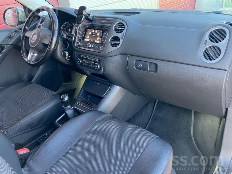 Brown Volkswagen Tiguan 2012 in Talsi, with an engine capacity of 2.00 L and mileage of 312 thousand km for 6999 €, photo 17 on AUTOMOTO.COM.LV