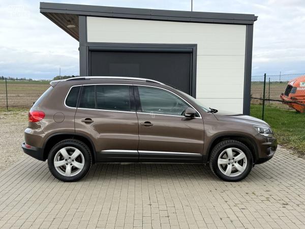 Brown Volkswagen Tiguan 2012 in Kaunas, with an engine capacity of 2.00 L and mileage of 275 thousand km for 7499 €, photo 7 on AUTOMOTO.COM.LV