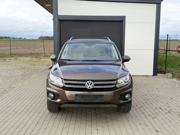 Brown Volkswagen Tiguan 2012 in Kaunas, with an engine capacity of 2.00 L and mileage of 275 thousand km for 7499 €, photo 9 on AUTOMOTO.COM.LV