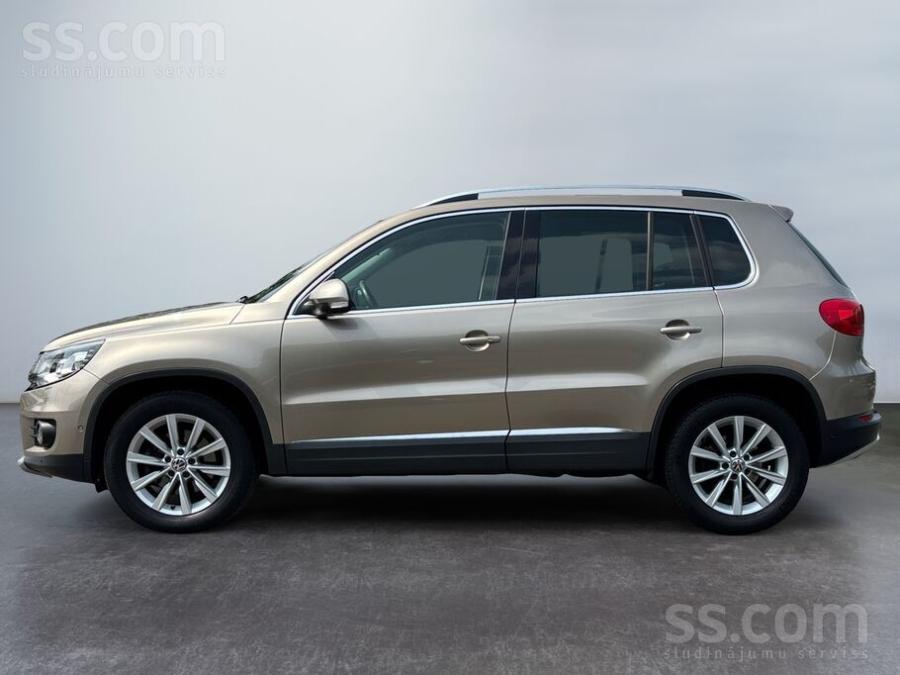 Brown Volkswagen Tiguan 2013 in Riga, with an engine capacity of 2.00 L and mileage of 138 thousand km for 7800 €, photo 2 on AUTOMOTO.COM.LV