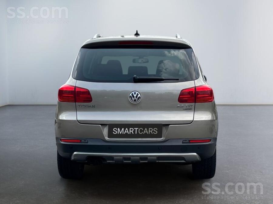 Brown Volkswagen Tiguan 2013 in Riga, with an engine capacity of 2.00 L and mileage of 138 thousand km for 7800 €, photo 4 on AUTOMOTO.COM.LV