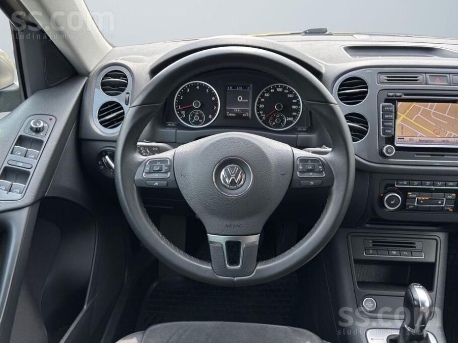 Brown Volkswagen Tiguan 2013 in Riga, with an engine capacity of 2.00 L and mileage of 138 thousand km for 7800 €, photo 12 on AUTOMOTO.COM.LV