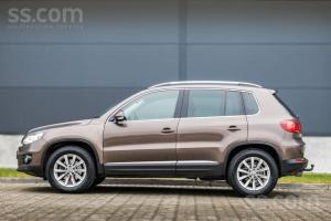 Brown Volkswagen Tiguan 2013 in Riga, with an engine capacity of 2.00 L and mileage of 200 thousand km for 11990 €, photo 5 on AUTOMOTO.COM.LV