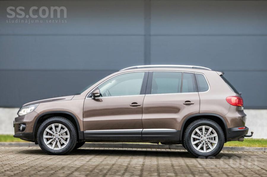 Brown Volkswagen Tiguan 2013 in Riga, with an engine capacity of 2.00 L and mileage of 200 thousand km for 11990 €, photo 5 on AUTOMOTO.COM.LV
