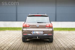 Brown Volkswagen Tiguan 2013 in Riga, with an engine capacity of 2.00 L and mileage of 200 thousand km for 11990 €, photo 10 on AUTOMOTO.COM.LV