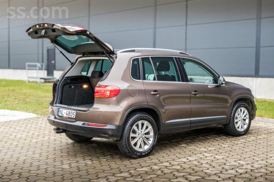 Brown Volkswagen Tiguan 2013 in Riga, with an engine capacity of 2.00 L and mileage of 200 thousand km for 11990 €, photo 11 on AUTOMOTO.COM.LV