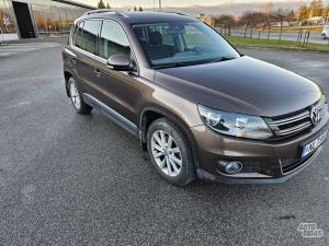 Brūns Volkswagen Tiguan 2013 Panevēža, ar dzinēja tilpumu 2.00 L un nobraukumu 282 tūkst. km par 6800 €, foto  vietnē AUTOMOTO.COM.LV