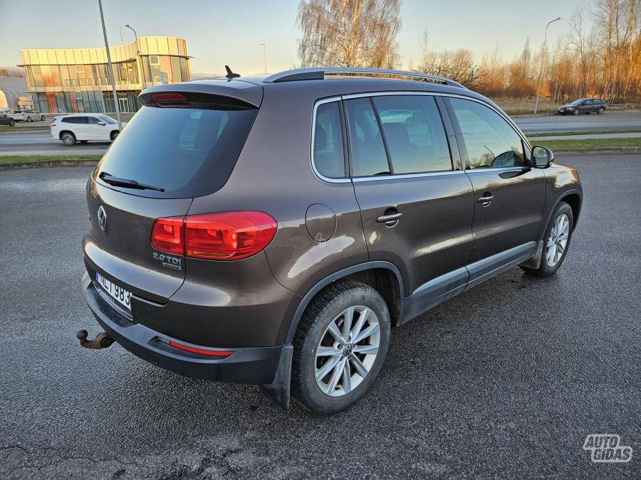 Brown Volkswagen Tiguan 2013 in Panevezys, with an engine capacity of 2.00 L and mileage of 282 thousand km for 6800 €, photo 8 on AUTOMOTO.COM.LV