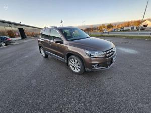 Brūns Volkswagen Tiguan 2013 Panevēža, ar dzinēja tilpumu 1.97 L un nobraukumu 282 tūkst. km par 6800 €, foto 18 vietnē AUTOMOTO.COM.LV