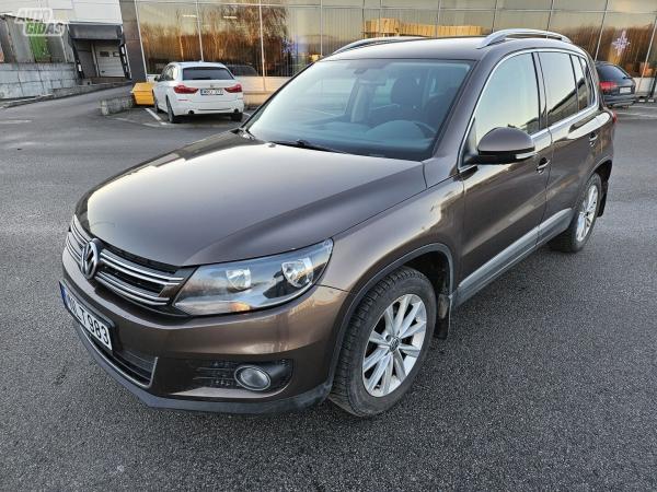 Brown Volkswagen Tiguan 2013 in Panevezys, with an engine capacity of 2.00 L and mileage of 282 thousand km for 6700 €, photo 3 on AUTOMOTO.COM.LV