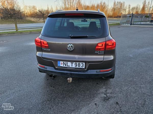 Brown Volkswagen Tiguan 2013 in Panevezys, with an engine capacity of 2.00 L and mileage of 282 thousand km for 6700 €, photo 6 on AUTOMOTO.COM.LV