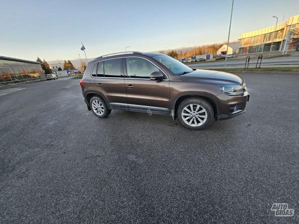 Brown Volkswagen Tiguan 2013 in Panevezys, with an engine capacity of 2.00 L and mileage of 282 thousand km for 6700 €, photo 9 on AUTOMOTO.COM.LV