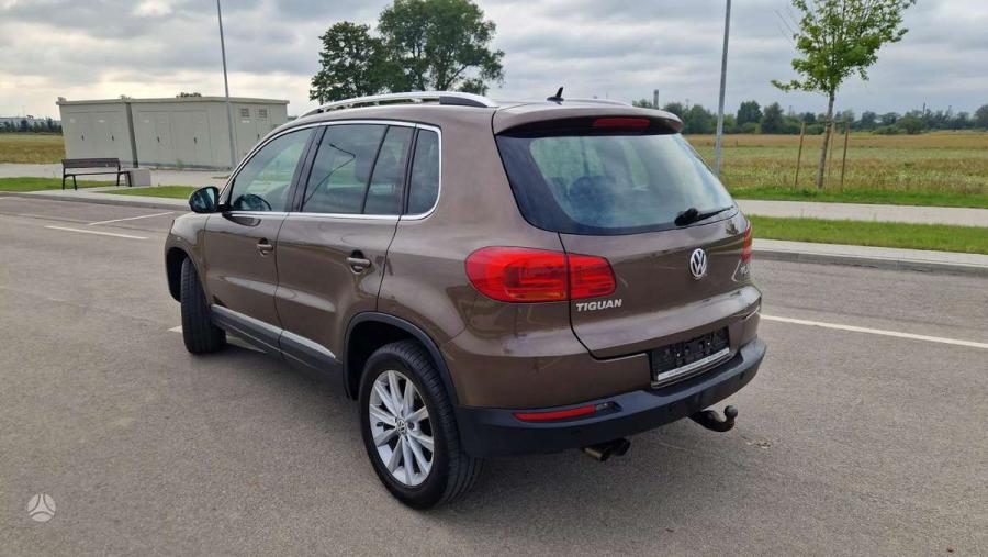 Brūns Volkswagen Tiguan 2013 Marijampole, ar dzinēja tilpumu 1.97 L un nobraukumu 300 tūkst. km par 7990 €, foto 16 vietnē AUTOMOTO.COM.LV