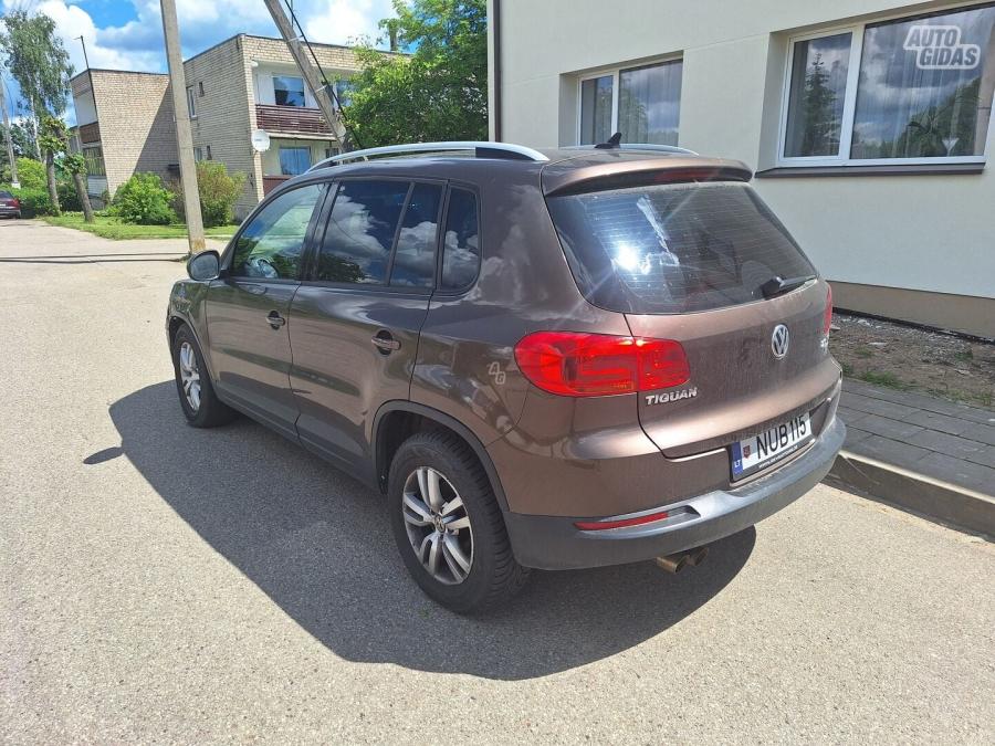Brūns Volkswagen Tiguan 2013 Ignalina, ar dzinēja tilpumu 2.00 L un nobraukumu 295 tūkst. km par 4450 €, foto 5 vietnē AUTOMOTO.COM.LV
