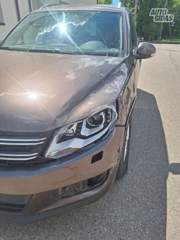 Brūns Volkswagen Tiguan 2013 Ignalina, ar dzinēja tilpumu 2.00 L un nobraukumu 295 tūkst. km par 4450 €, foto 6 vietnē AUTOMOTO.COM.LV