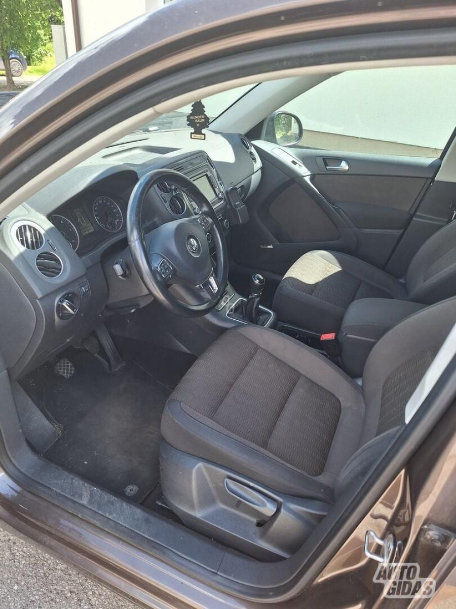 Brūns Volkswagen Tiguan 2013 Ignalina, ar dzinēja tilpumu 2.00 L un nobraukumu 295 tūkst. km par 4450 €, foto 13 vietnē AUTOMOTO.COM.LV