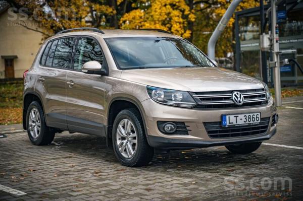 Brown Volkswagen Tiguan 2013 in Riga, with an engine capacity of 1.40 L and mileage of 0 thousand km for 8990 €, photo 3 on AUTOMOTO.COM.LV