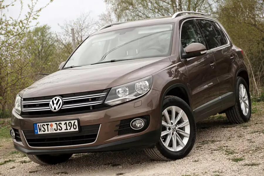 Brown Volkswagen Tiguan 2013 in Riga, with an engine capacity of 2.00 L and mileage of 154 thousand km for 12700 €, photo 5 on AUTOMOTO.COM.LV