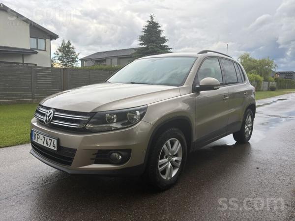 Brūns Volkswagen Tiguan 2013 Rīga, ar dzinēja tilpumu 1.40 L un nobraukumu 240 tūkst. km par 9300 €, foto 1 vietnē AUTOMOTO.COM.LV