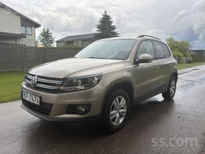 Brūns Volkswagen Tiguan 2013 Rīga, ar dzinēja tilpumu 1.40 L un nobraukumu 240 tūkst. km par 9300 €, foto  vietnē AUTOMOTO.COM.LV