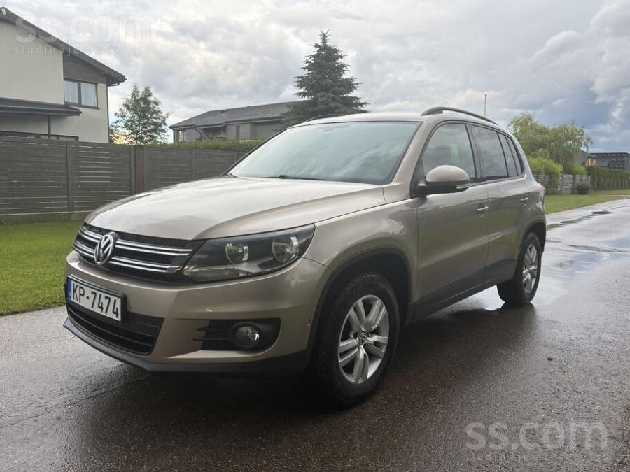 Brūns Volkswagen Tiguan 2013 Rīga, ar dzinēja tilpumu 1.40 L un nobraukumu 240 tūkst. km par 9300 €, foto 1 vietnē AUTOMOTO.COM.LV
