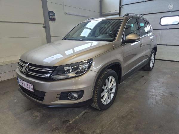 Brown Volkswagen Tiguan 2013 in Raseiniai, with an engine capacity of 1.97 L and mileage of 241 thousand km for 8400 €, photo 1 on AUTOMOTO.COM.LV