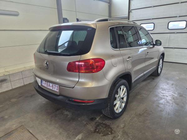 Brown Volkswagen Tiguan 2013 in Raseiniai, with an engine capacity of 1.97 L and mileage of 241 thousand km for 8400 €, photo 4 on AUTOMOTO.COM.LV