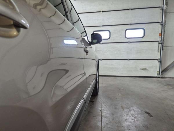 Brown Volkswagen Tiguan 2013 in Raseiniai, with an engine capacity of 1.97 L and mileage of 241 thousand km for 8400 €, photo 8 on AUTOMOTO.COM.LV