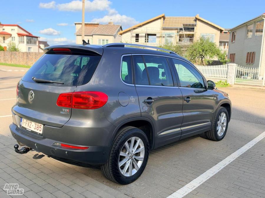 Brūns Volkswagen Tiguan 2013 Ignalina, ar dzinēja tilpumu 2.00 L un nobraukumu 233 tūkst. km par 8990 €, foto 25 vietnē AUTOMOTO.COM.LV