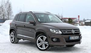 Brown Volkswagen Tiguan 2014 in Taurage, with an engine capacity of 1.97 L and mileage of 225 thousand km for 10400 €, photo 7 on AUTOMOTO.COM.LV