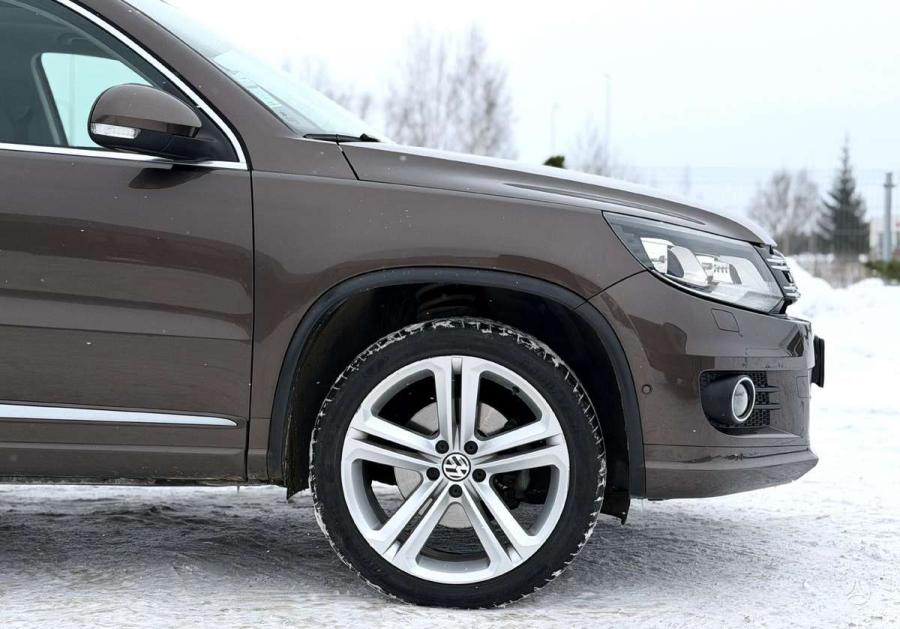 Brown Volkswagen Tiguan 2014 in Taurage, with an engine capacity of 1.97 L and mileage of 225 thousand km for 10400 €, photo 10 on AUTOMOTO.COM.LV