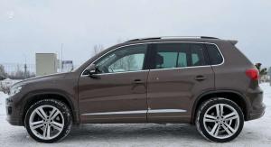 Brown Volkswagen Tiguan 2014 in Taurage, with an engine capacity of 1.97 L and mileage of 225 thousand km for 10400 €, photo 12 on AUTOMOTO.COM.LV