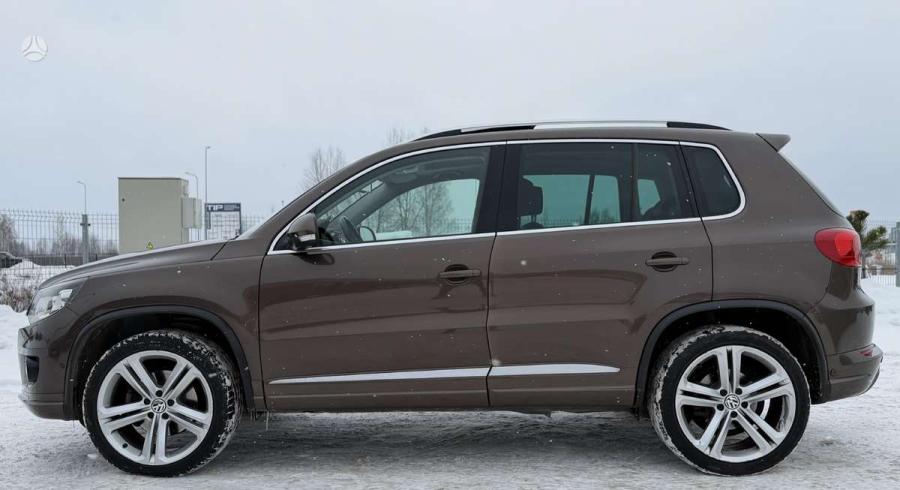 Brown Volkswagen Tiguan 2014 in Taurage, with an engine capacity of 1.97 L and mileage of 225 thousand km for 10400 €, photo 12 on AUTOMOTO.COM.LV