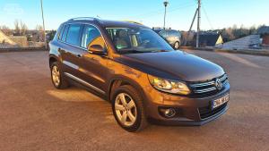 Brūns Volkswagen Tiguan 2014 Kelmė, ar dzinēja tilpumu 2.00 L un nobraukumu 120 tūkst. km par 10600 €, foto  vietnē AUTOMOTO.COM.LV