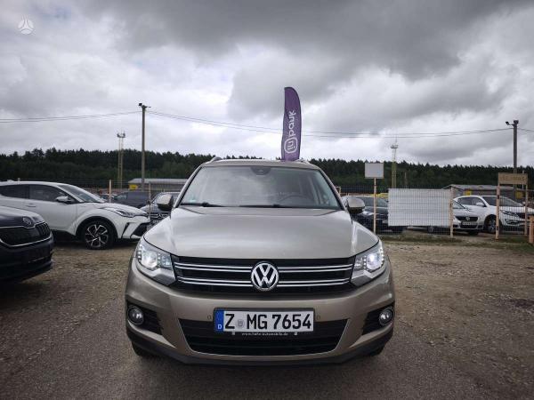 Brūns Volkswagen Tiguan 2014 Viļņa, ar dzinēja tilpumu 2.00 L un nobraukumu 246 tūkst. km par 9850 €, foto 2 vietnē AUTOMOTO.COM.LV