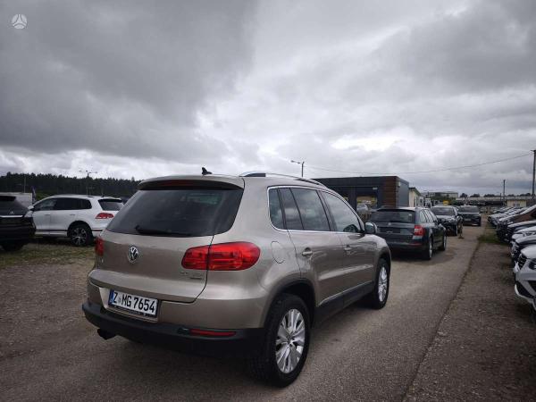 Brūns Volkswagen Tiguan 2014 Viļņa, ar dzinēja tilpumu 2.00 L un nobraukumu 246 tūkst. km par 9850 €, foto 7 vietnē AUTOMOTO.COM.LV