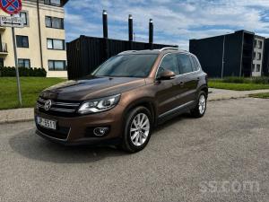 Brūns Volkswagen Tiguan 2014 Rīga, ar dzinēja tilpumu 2.00 L un nobraukumu 188 tūkst. km par 9500 €, foto  vietnē AUTOMOTO.COM.LV